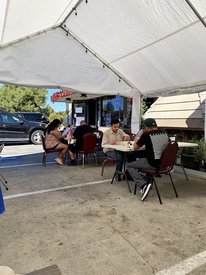 Pandemic pivoting at its finest&mdash;outdoor dining under a simple white tent proves good food doesn't need fancy surroundings to taste like home.