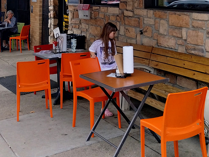 Outdoor seating that says, "Pennsylvania summers were made for hot dogs and cold drinks." Those orange chairs are practically begging you to sit and stay awhile.