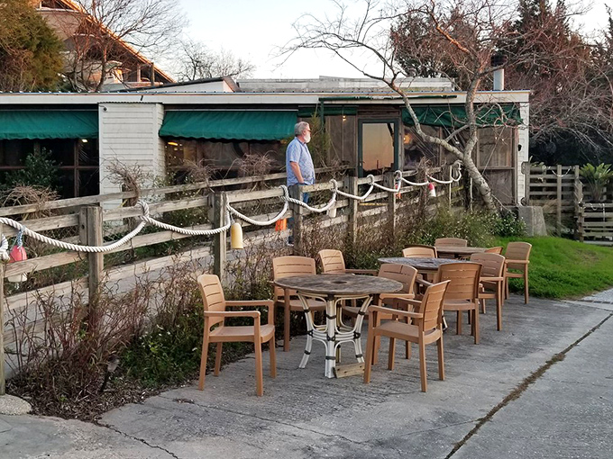 Outdoor dining that captures the essence of coastal living. Sometimes the best seasoning is fresh air and the sound of water lapping nearby.