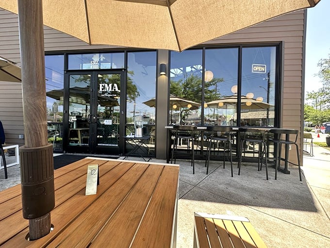 The outdoor seating area: where vitamin D meets vitamin Delicious. Those umbrellas don't just block sun; they create little islands of culinary bliss.