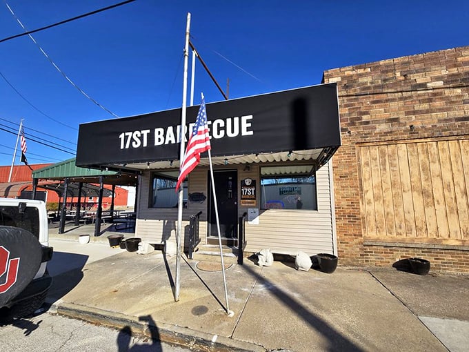 The American flag flutters outside, as if to say, "This, my friends, is what makes this country great&mdash;meat transformed by smoke, time, and tradition."