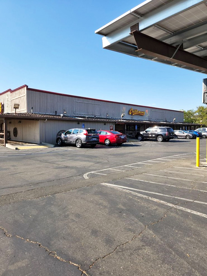 The parking lot might not win beauty contests, but it serves its purpose&mdash;a humble gateway to the flavor explosion waiting inside those wooden doors.