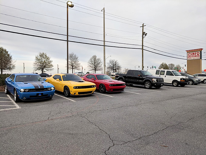 Even the muscle cars know where to find good eats in Sugar Hill. The parking lot tells its own story about who dines here.