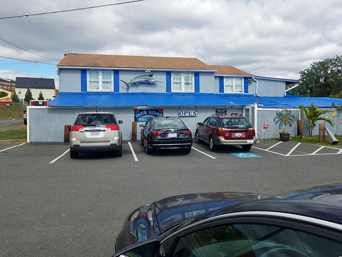 The blue marlin painted on the facade serves as a beacon for hungry travelers&mdash;maritime GPS for those seeking seafood salvation.