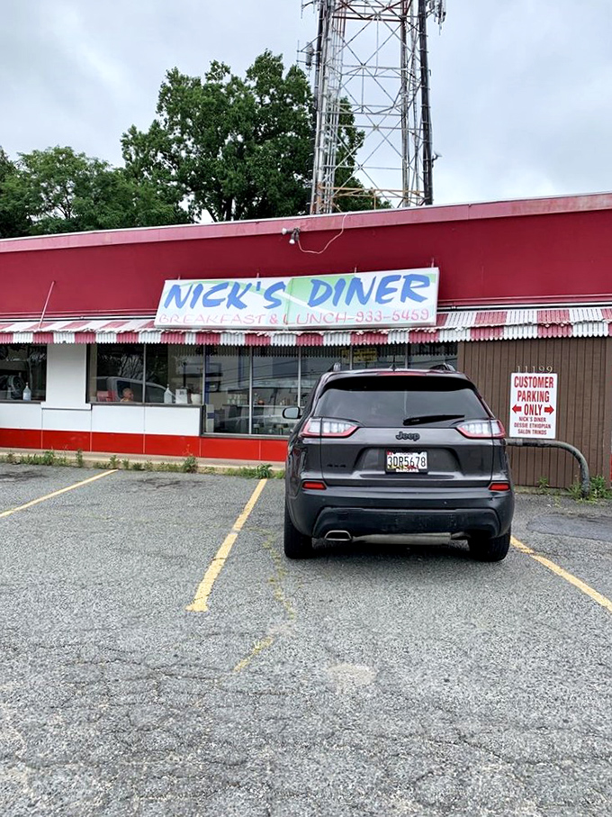 The parking spot might not be glamorous, but it's where Maryland breakfast pilgrimages begin&mdash;a red-awninged sanctuary of morning comfort just steps away.