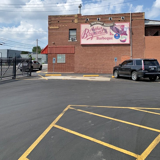 Even the parking lot feels like hallowed ground, with that vintage sign promising transformative barbecue experiences just steps away. 