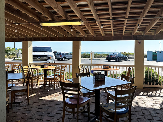 Patio seating that offers a side of vitamin D with your breakfast. The wooden pergola creates dappled light perfect for morning contemplation.
