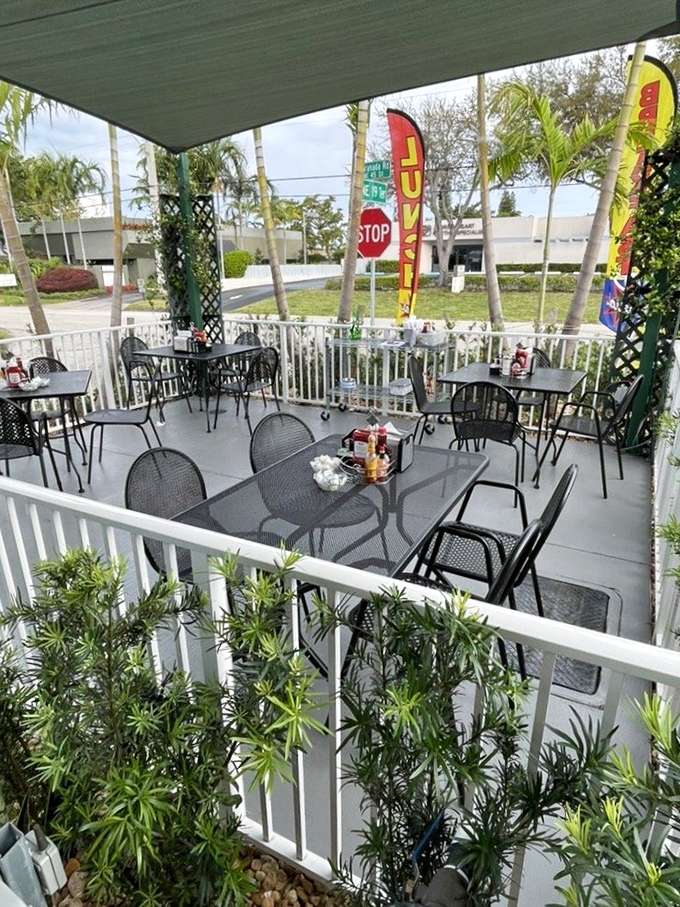 The garden patio offers al fresco dining under Florida skies, where pancakes taste even better with a side of gentle breeze.