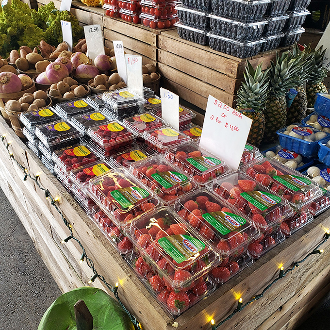 Fresh produce arranged with market precision. Nature's candy displayed alongside actual fruit—Pennsylvania's bounty at its finest.