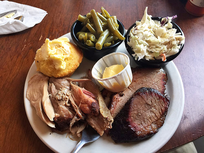 The sampler plate that answers life's most difficult question: "Why choose between smoked chicken, brisket, and sides when you can have it all?"