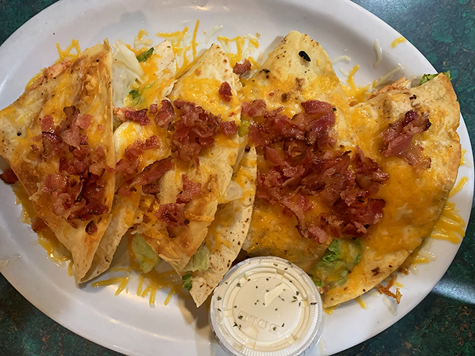 Quesadillas that don't pretend to be authentic but succeed at being delicious. Cheese, bacon, and satisfaction folded into a handheld package.