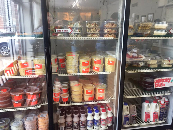 The refrigerator case, filled with sides that complement the star attraction &ndash; because even the greatest chicken deserves worthy supporting players.