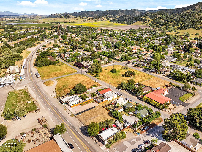 From above, Los Alamos reveals itself as a perfect patchwork of small-town America cradled by golden hills and agricultural abundance.