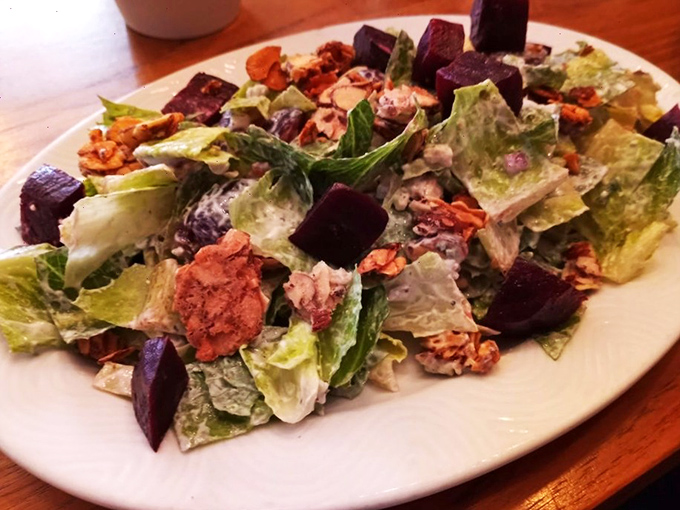 Fresh salad greens tossed with colorful vegetables prove that Lucky's takes every dish seriously.