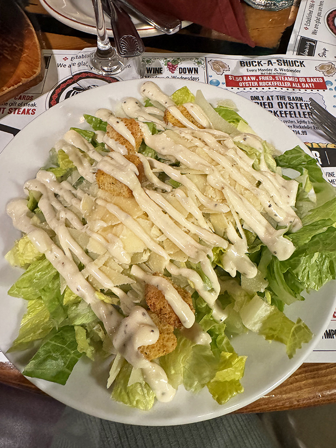 Caesar salad dressed to impress&mdash;crisp romaine wearing creamy dressing like it's heading to a formal dinner party.
