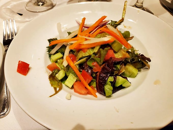 A salad that didn't get the memo about steakhouse sides being an afterthought. Fresh, vibrant, and unapologetically colorful.