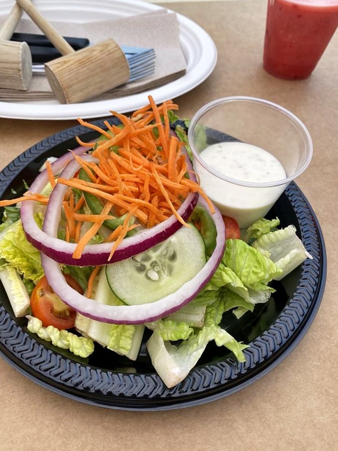 Even the salad gets special treatment &ndash; crisp, colorful, and ready to provide the illusion of healthfulness before diving back into seafood territory.