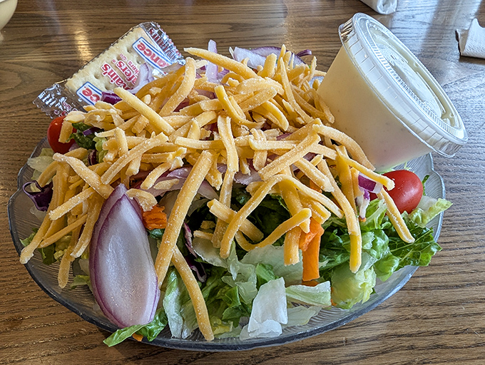 A garden-fresh salad topped with crispy tortilla strips. Because sometimes you need something green before diving into more seafood.
