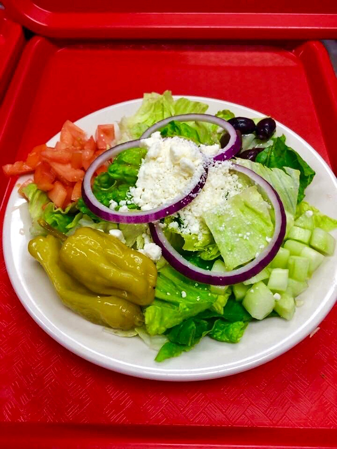 Even the salads look happy here&mdash;crisp, colorful, and substantial enough to satisfy without triggering burger-envy at neighboring tables.