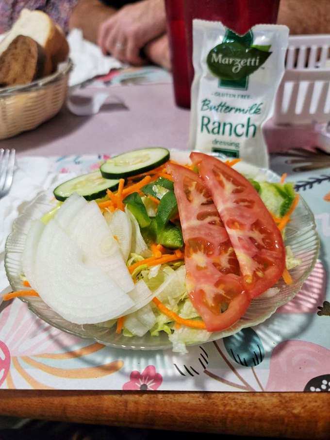 Garden-fresh salad that somehow makes you feel virtuous while waiting for your fried chicken&mdash;the culinary equivalent of reading War and Peace before binge-watching reality TV.
