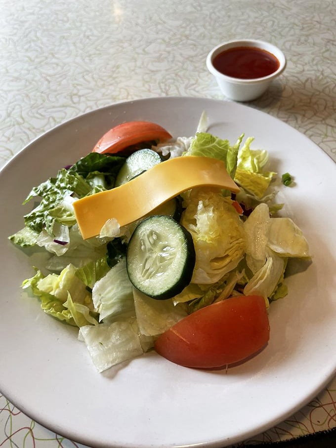 A side salad that doesn't apologize for being healthy&mdash;crisp, fresh, and colorful enough to momentarily distract you from your burger.