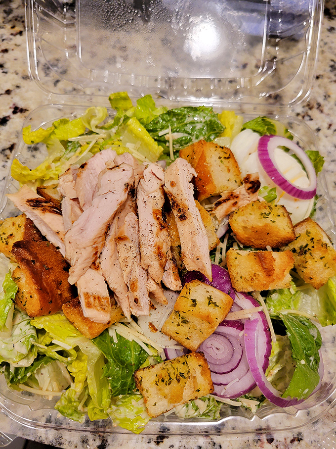 The chicken Caesar salad strikes that impossible balance between "I should eat something healthy" and "I deserve something delicious" with crisp romaine and seasoned croutons.