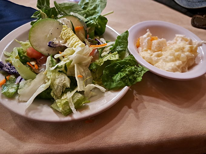 A side salad that doesn't apologize for being a side salad. Crisp, fresh, and the perfect counterpoint to the indulgence that surrounds it.