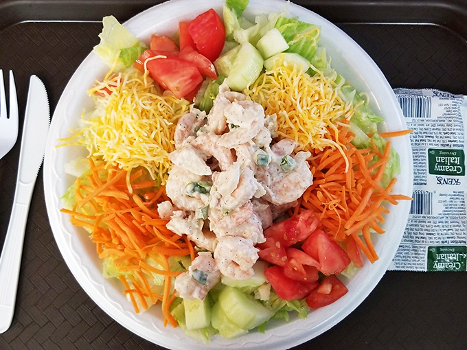 A seafood salad that proves healthy eating doesn't mean sacrificing flavor. Fresh shrimp nestled among vibrant vegetables&mdash;Neptune's garden on a plate.