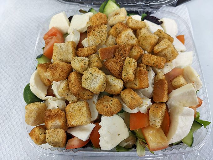 Fresh salads prove Cosmi's isn't just about sandwiches. Those golden croutons are the supporting actors that deserve their own spotlight.