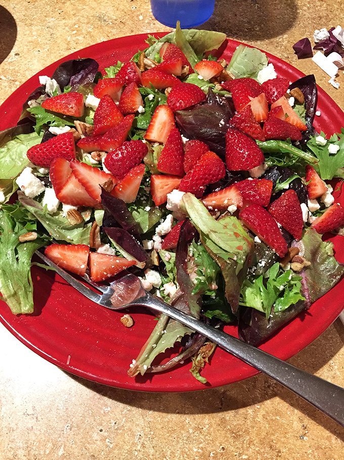 A summer salad that doesn't apologize for its simplicity. Fresh strawberries, mixed greens, and crumbled cheese create a colorful canvas that tastes like a Pennsylvania June afternoon.