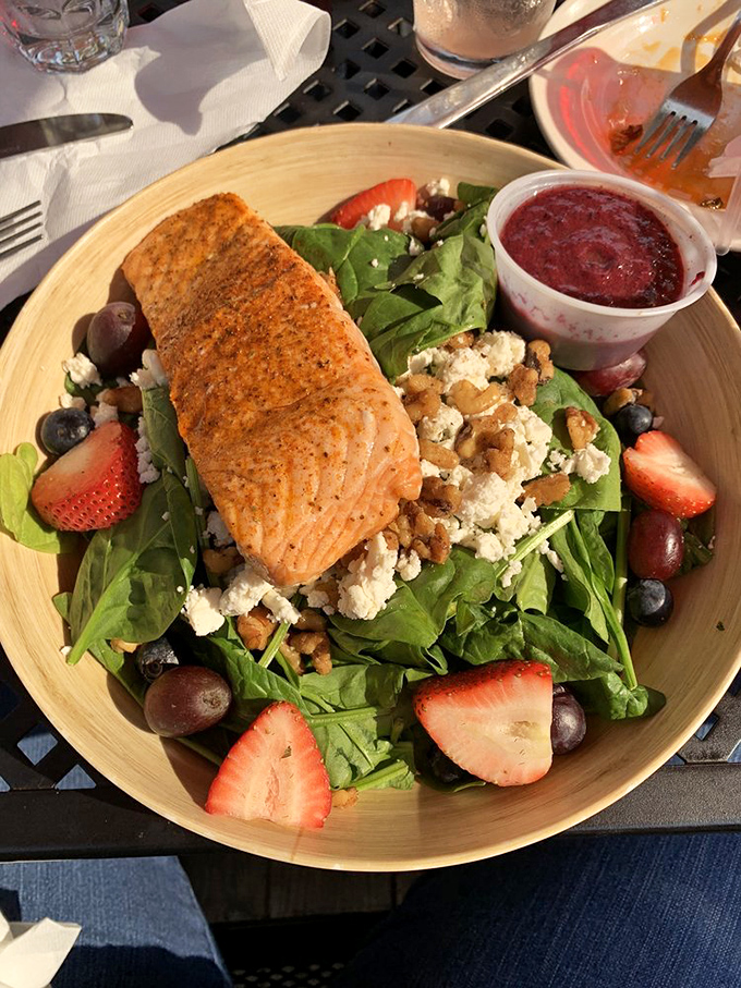 A salad that doesn't apologize for being healthy. Fresh salmon, berries, and greens come together in a dish that satisfies without sacrificing flavor.