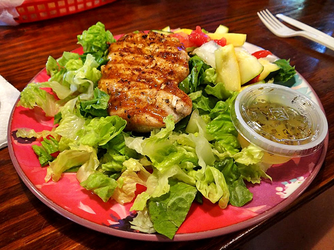 A salad that proves healthy eating doesn't have to be punishment &ndash; fresh greens cradling perfectly grilled protein with dressing that makes vegetables worth eating.