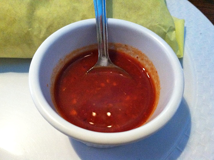 That vibrant red salsa isn't just a condiment&mdash;it's liquid sunshine with a kick that transforms everything it touches.