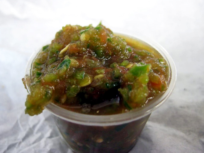 The legendary salsa&mdash;a perfect balance of heat, acidity, and freshness that elevates everything it touches. Worth requesting extra containers.