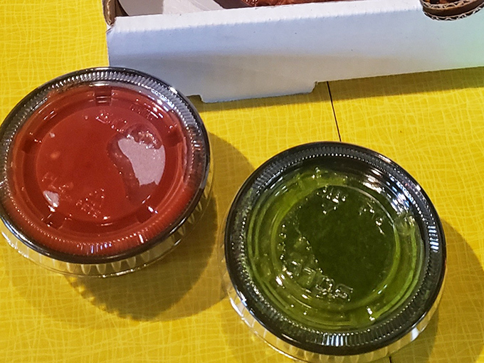 The sauces &ndash; one classic red, one herbal green &ndash; are the unsung heroes of any great pizza experience, ready to elevate your crust-dipping game.