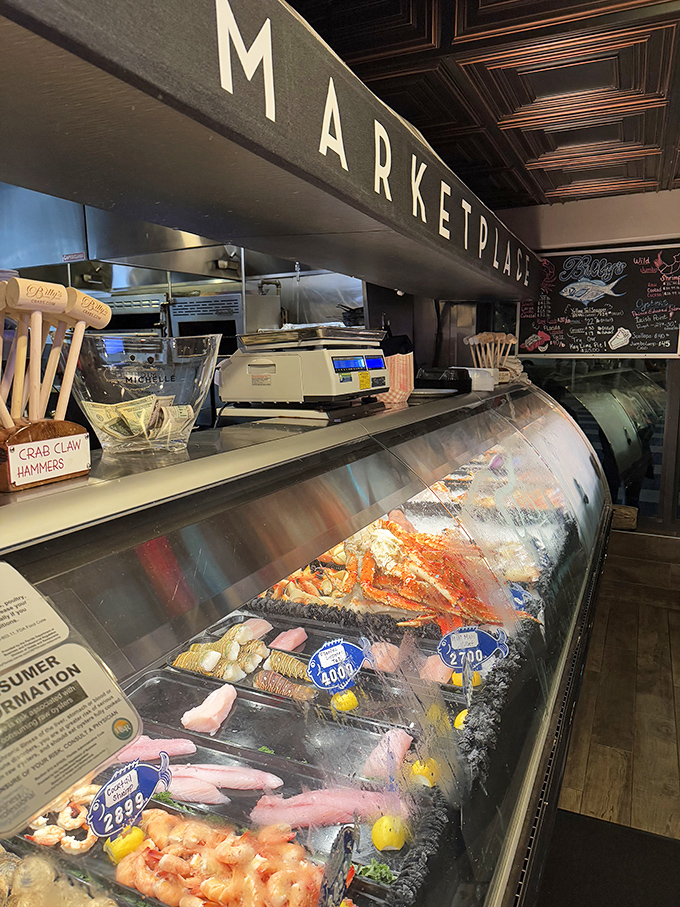 The "Marketplace" display case: where seafood shopping becomes an art form. Those crab claws are practically waving hello.