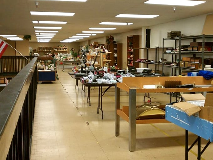 Tables loaded with donations waiting to be sorted and priced. Behind the scenes of bargain magic, where everyday items begin their journey to new homes.