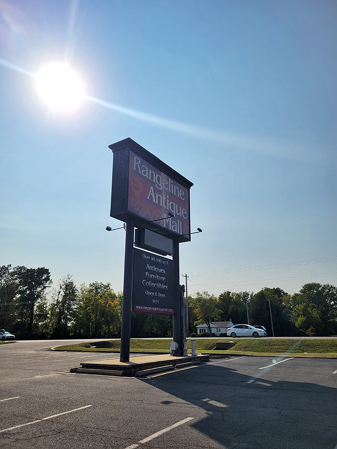 The sign beckons like a lighthouse for treasure hunters, promising over 40,000 square feet of "remember when" moments inside.