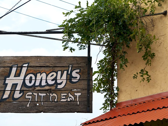 The sign says it all&mdash;simple, straightforward, and promising exactly what you need: a place to sit and eat food that makes you happy.