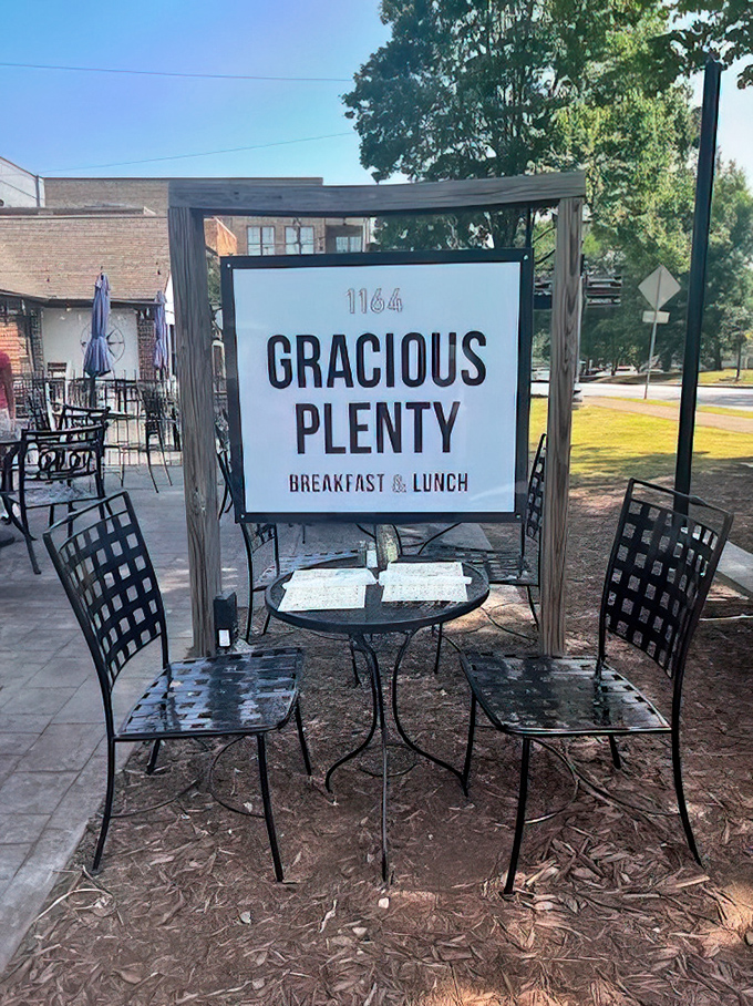 The sign says "Breakfast & Lunch," but what it really means is "Happiness Served Daily" in the heart of Roswell.