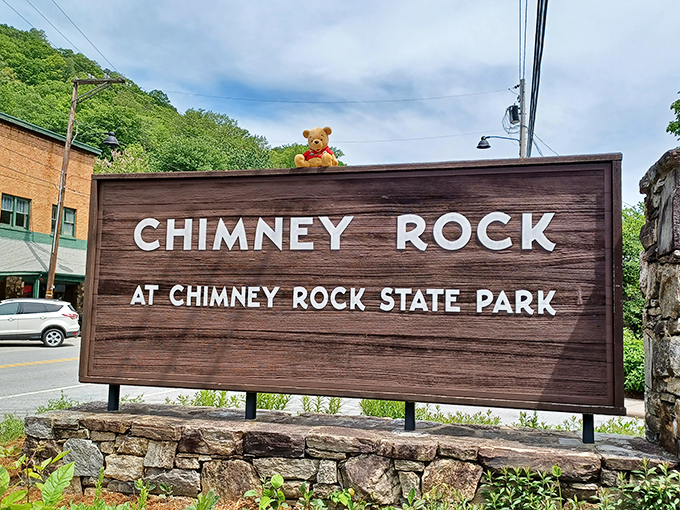 Even the park sign has a furry admirer &ndash; this teddy bear clearly knows where to find the best views in North Carolina.