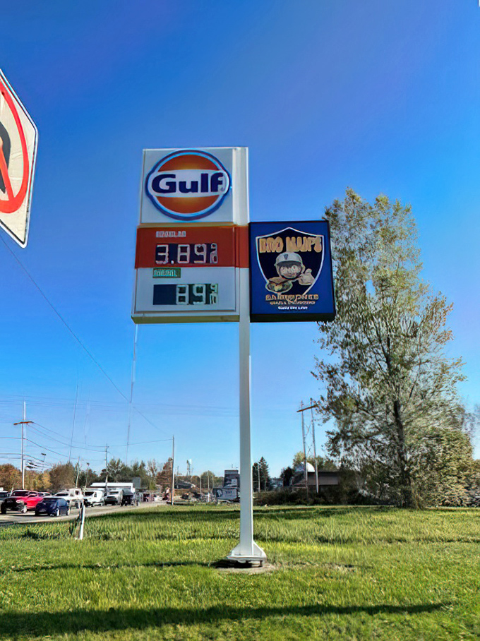 The Gulf sign with the Bro Man's banner&mdash;a beacon of hope for hungry travelers and locals alike. Follow it to flavor country.