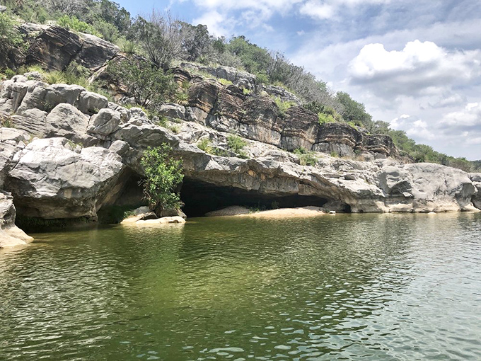 Secret hideaways carved by centuries of persistent water. These small caves whisper stories of flash floods and patient erosion to anyone who listens.