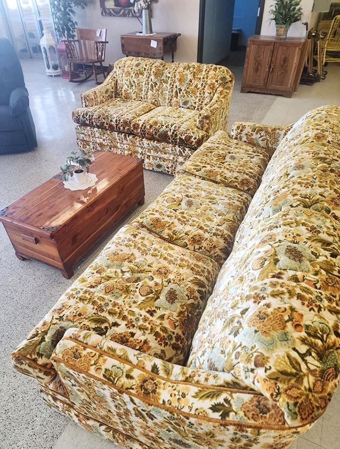 The 1970s called and left its most comfortable couch. This floral seating arrangement promises conversations about fondue recipes and moon landings.