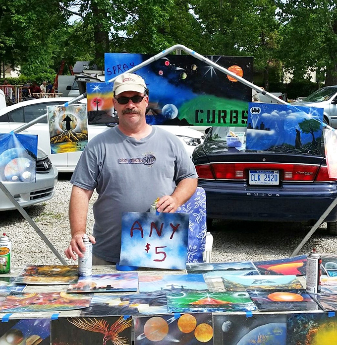 The cosmic artist's portable gallery&mdash;where $5 buys you a piece of spray-painted planetary wonder that somehow looks better at the flea market than at home.