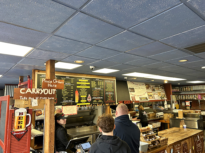 The moment of anticipation as customers place their orders. That menu board has witnessed countless first-timers become regulars in the span of a single meal.