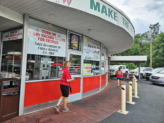 The familiar red shirts of the staff signal you've arrived at a place where tradition matters more than trends.