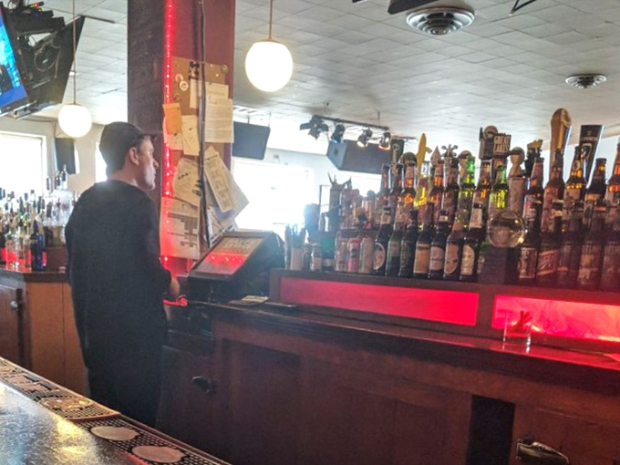 Behind every great hot dog experience is a dedicated bartender navigating a sea of bottles. The serious business of pairing the perfect beer with your custom creation.