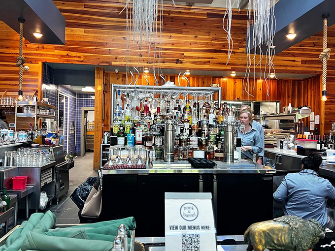 Where the magic happens. The bar staff orchestrates liquid happiness with the precision of symphony conductors and the creativity of jazz musicians.