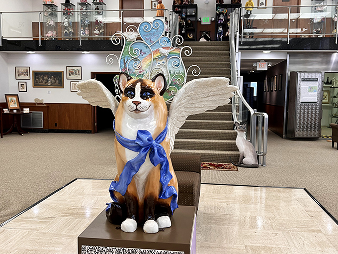 This winged cat statue combines the majesty of an angel with the attitude of a feline &ndash; a heavenly messenger who might knock your coffee off the table.